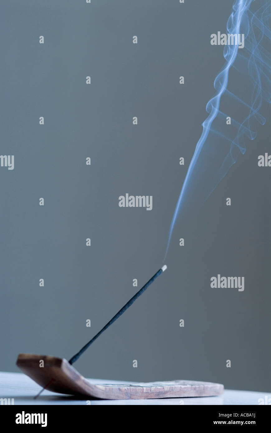 Close-up of a burning incense stick Stock Photo - Alamy
