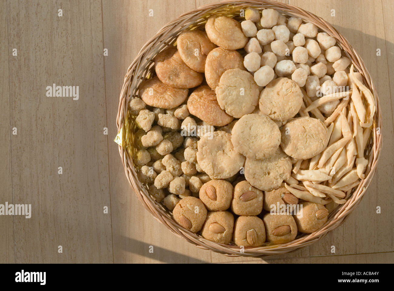Close-up of sweets and cookies in a wicker basket Stock Photo - Alamy