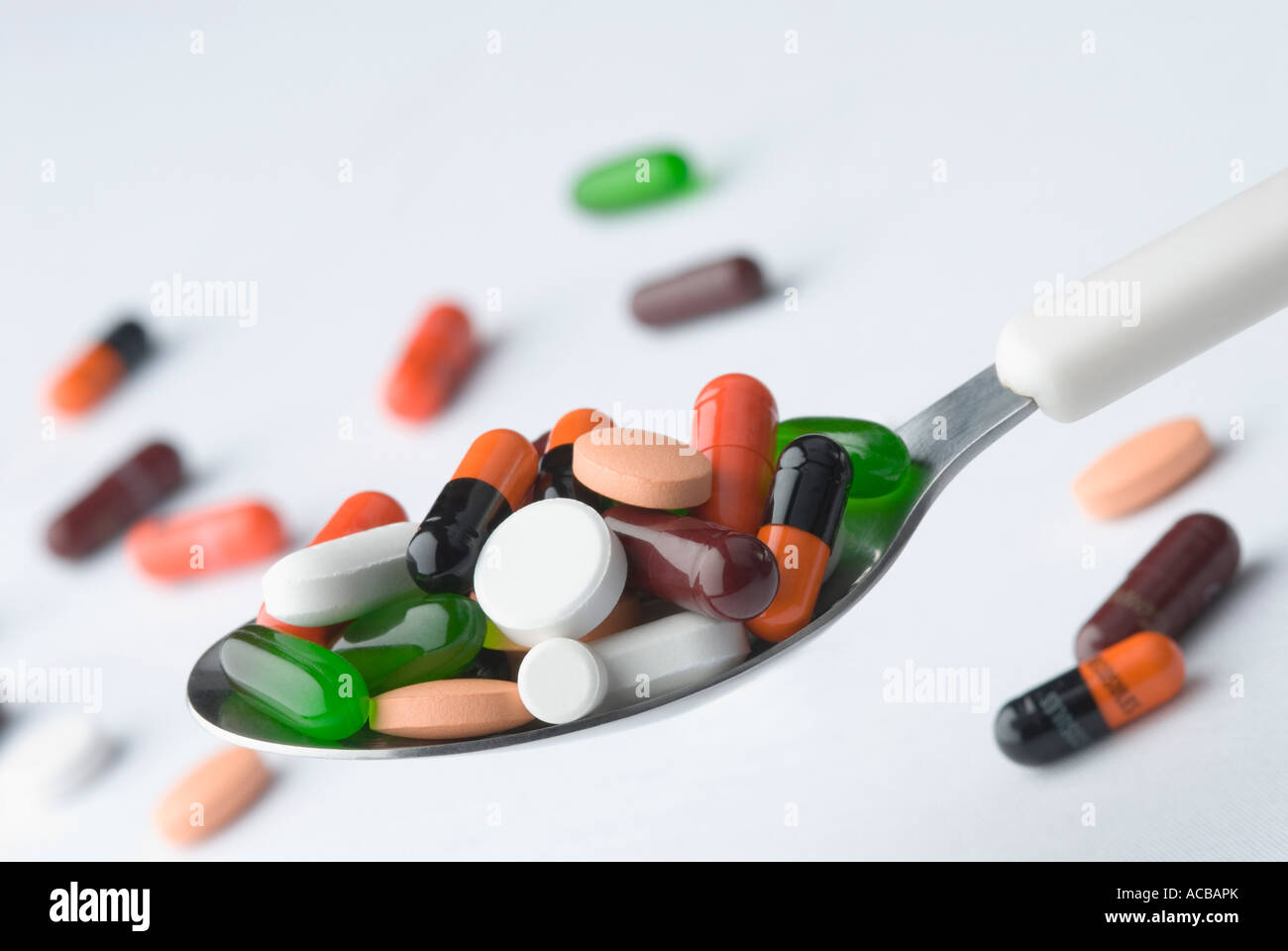 Tablets in a spoon hi-res stock photography and images - Alamy