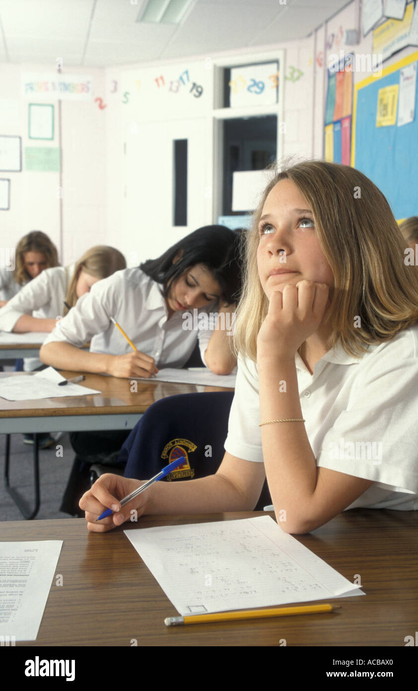 Teenage girl in secondary school class with contemplative look Stock ...
