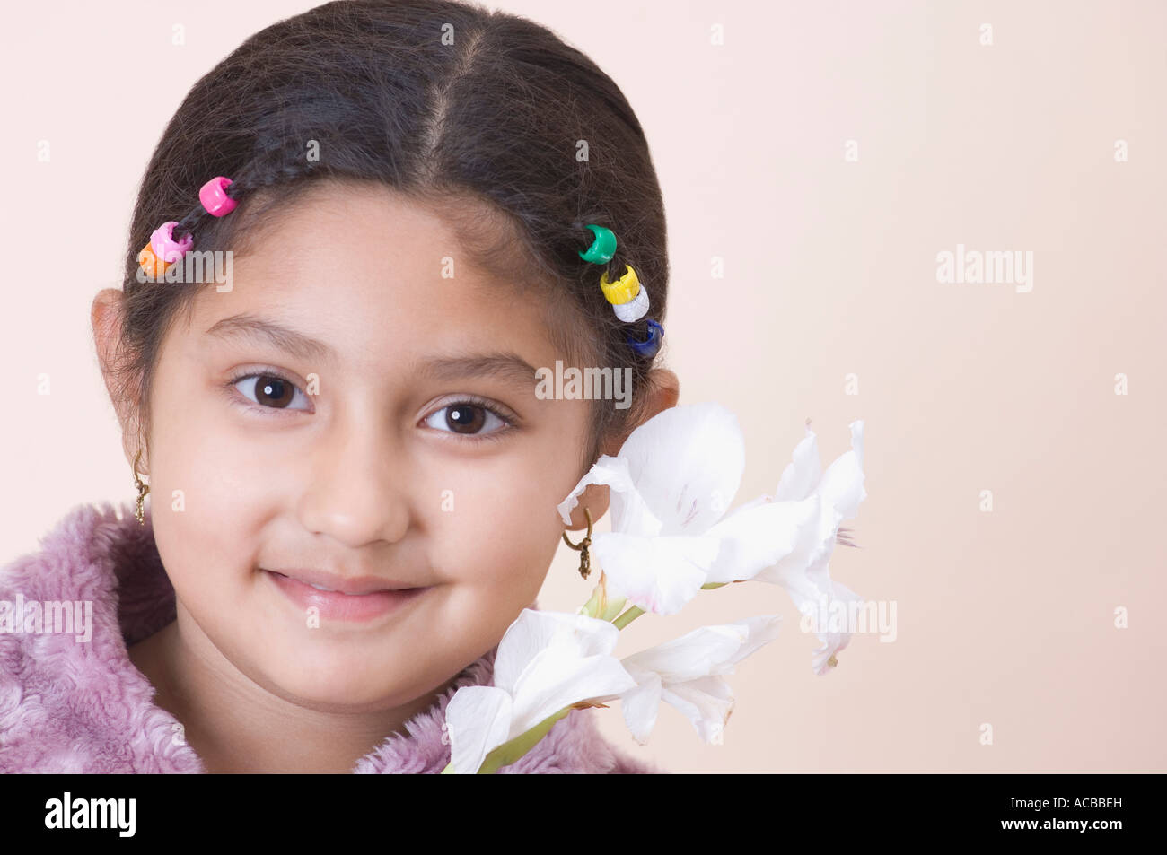 Portrait of a girl smirking Stock Photo - Alamy