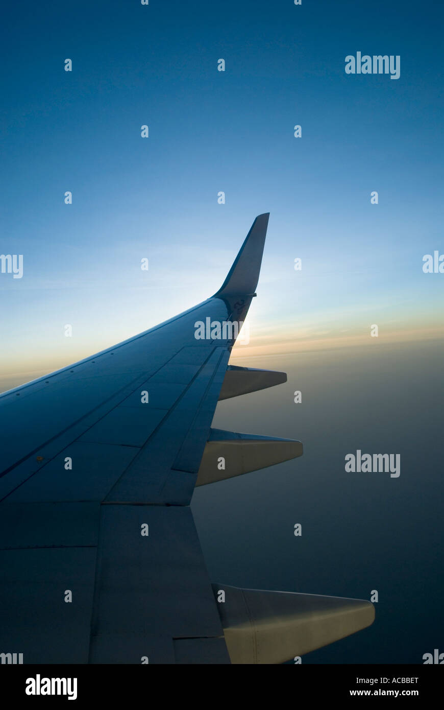 Airplane at dusk hi-res stock photography and images - Alamy