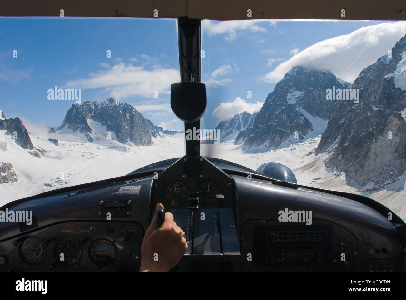 View from the cockpit of a bush plane flying over the Pika Glacier ...
