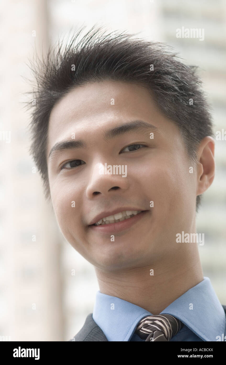 Portrait of a businessman smiling Stock Photo - Alamy