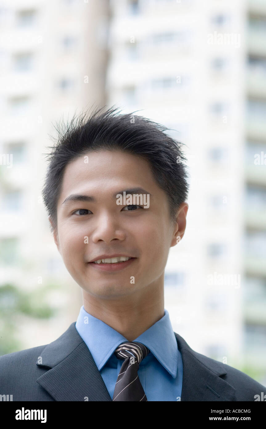 Portrait of a businessman smiling Stock Photo - Alamy