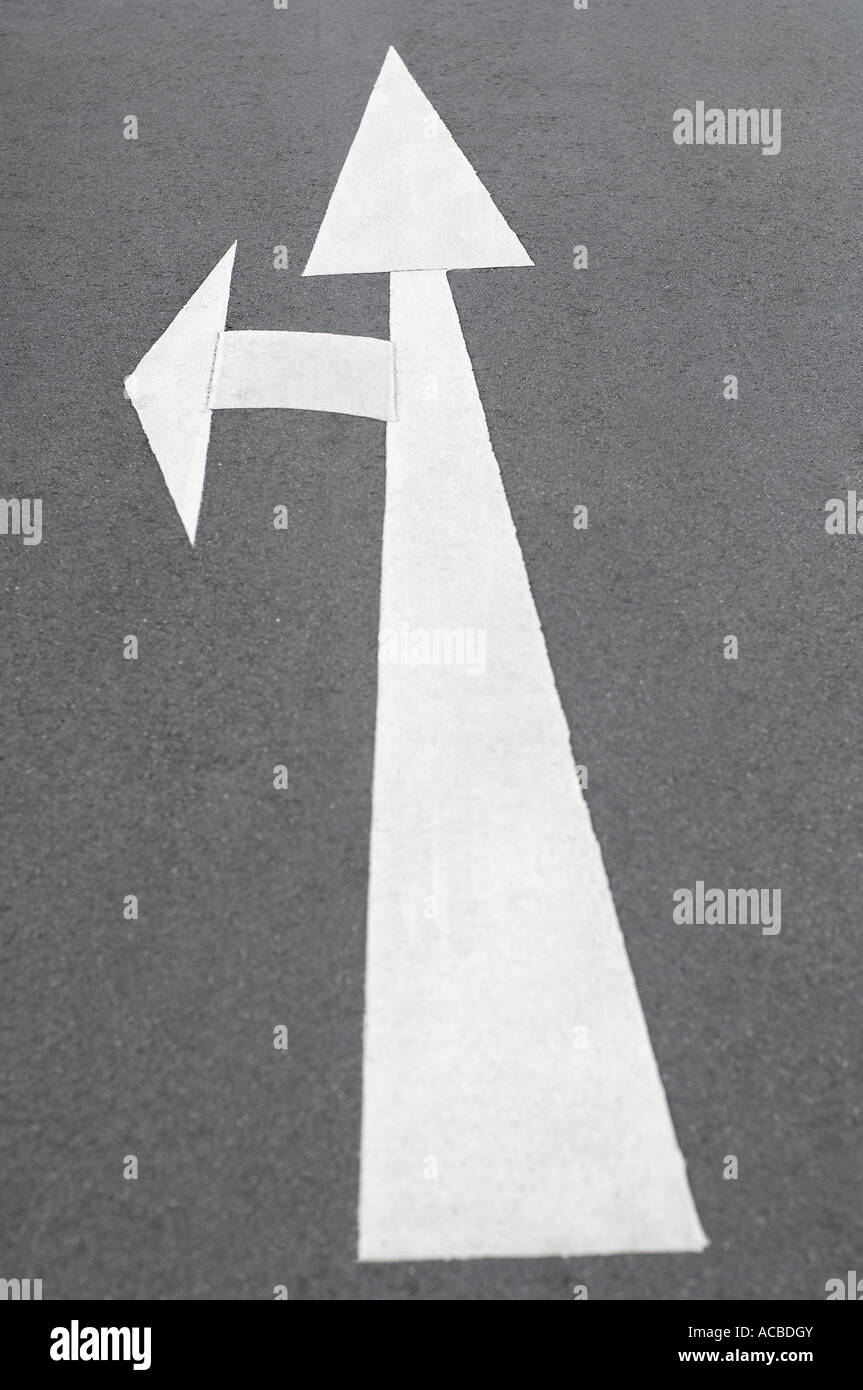 Arrow sign painted on the road Stock Photo - Alamy