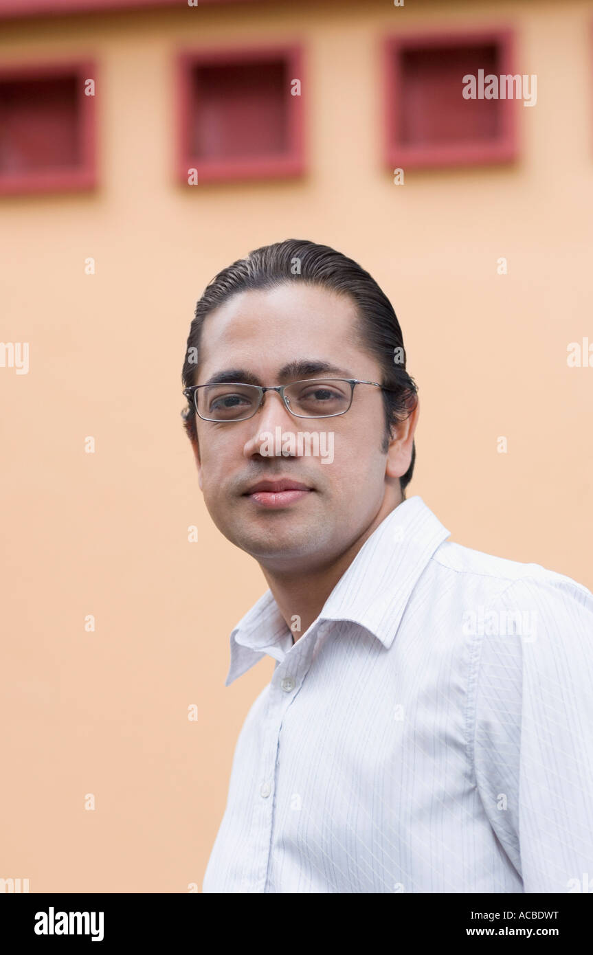 Portrait of a mid adult man wearing eyeglasses Stock Photo - Alamy