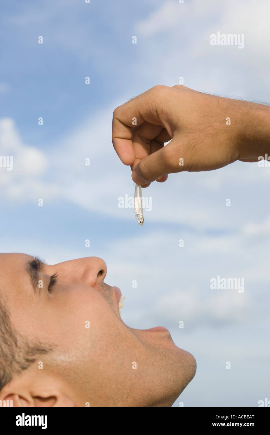 Man with dead fish eyes hi-res stock photography and images - Alamy