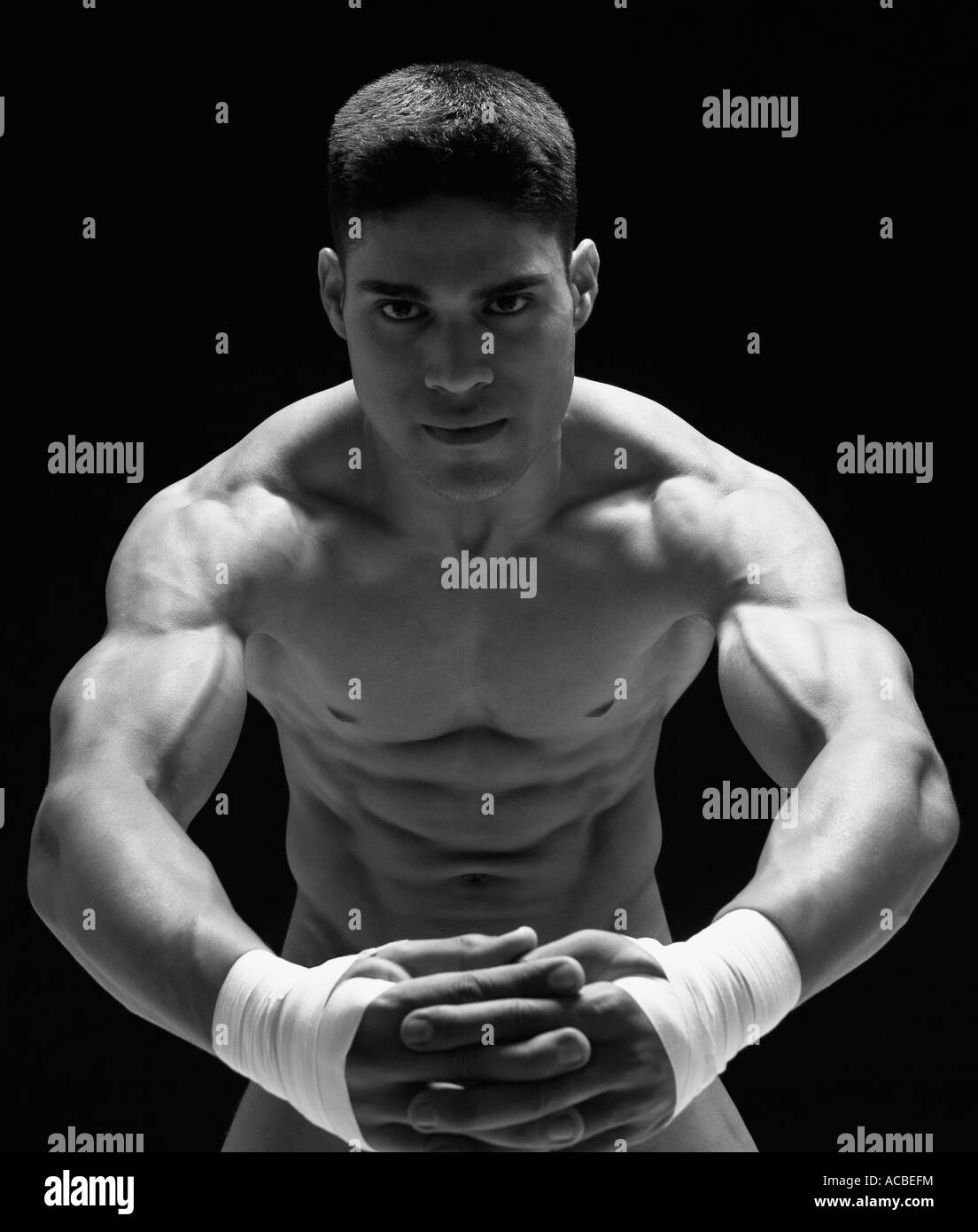 Portrait of a young man in boxing stance Stock Photo - Alamy