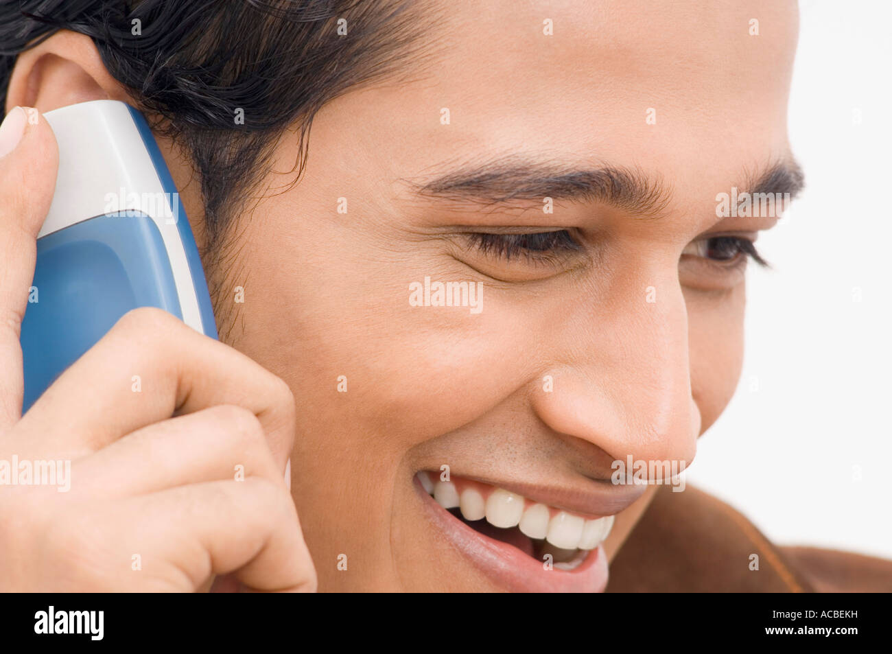 Indian talking mobile phone human face hi-res stock photography and ...