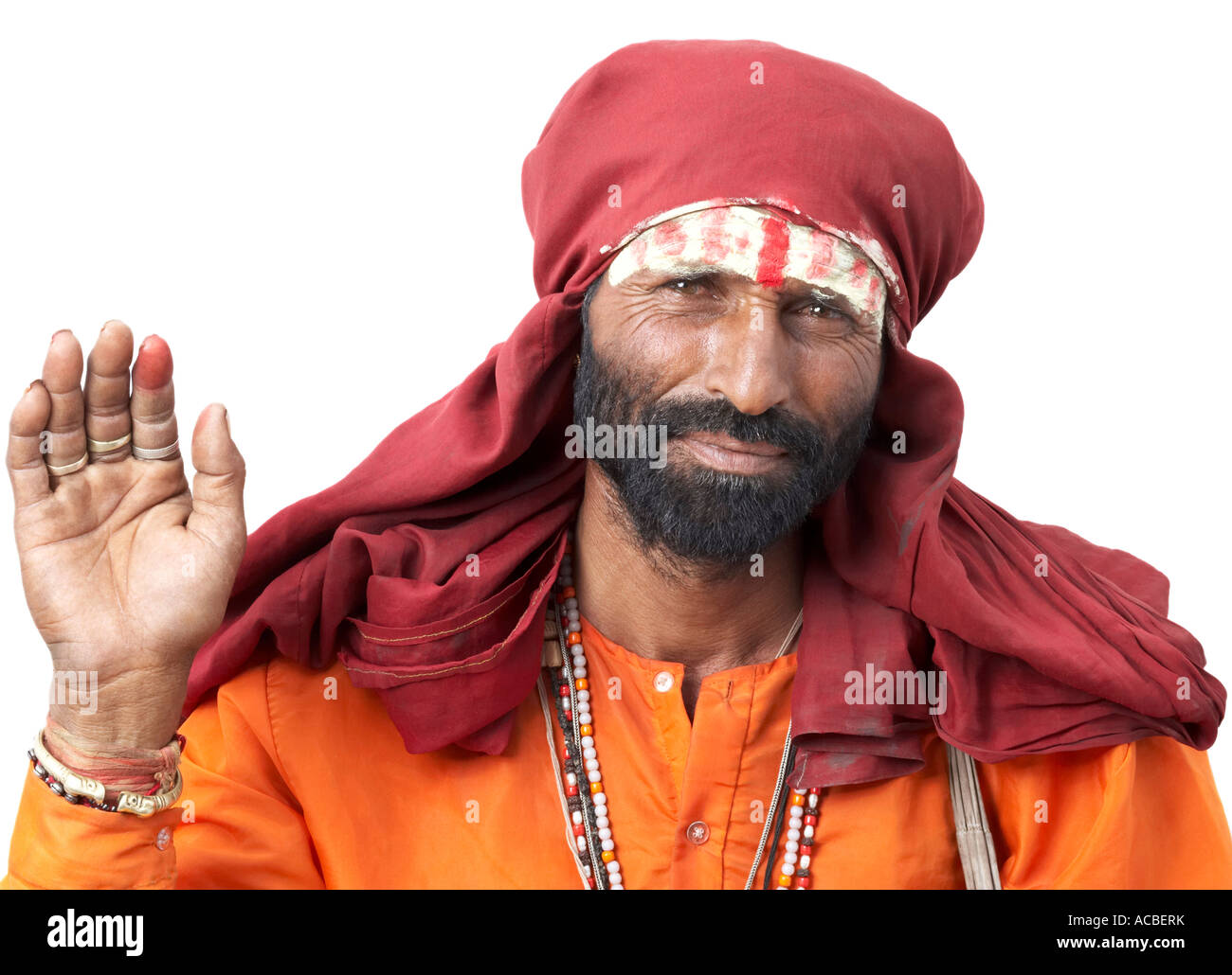 Portrait of a sadhu raising his hand as a blessing Stock Photo - Alamy