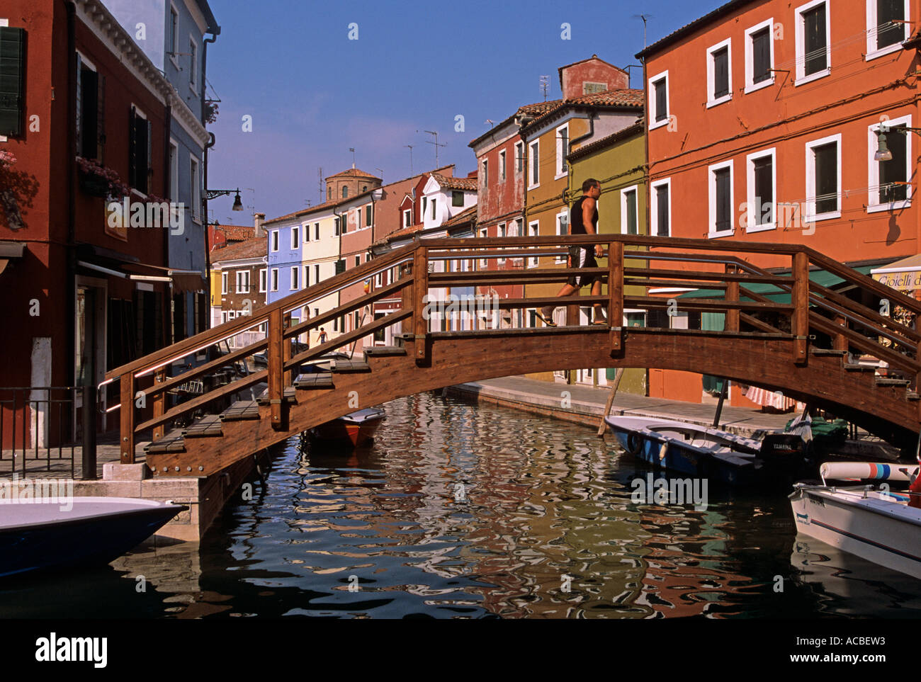 Footbridge and colourful waterfront houses, Venice, Italy Stock Photo ...