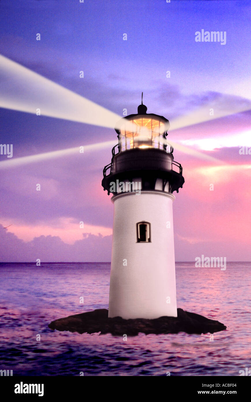 Solitary lighthouse with brightly lit lamp and light beams Stock Photo ...