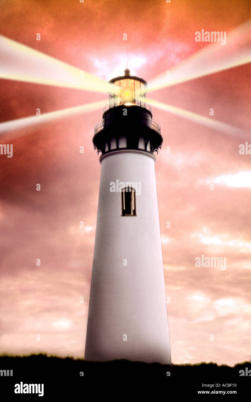 Solitary lighthouse with brightly lit lamp and light beams Stock Photo ...