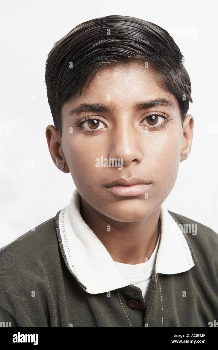 Portrait of a teenage boy looking serious Stock Photo - Alamy