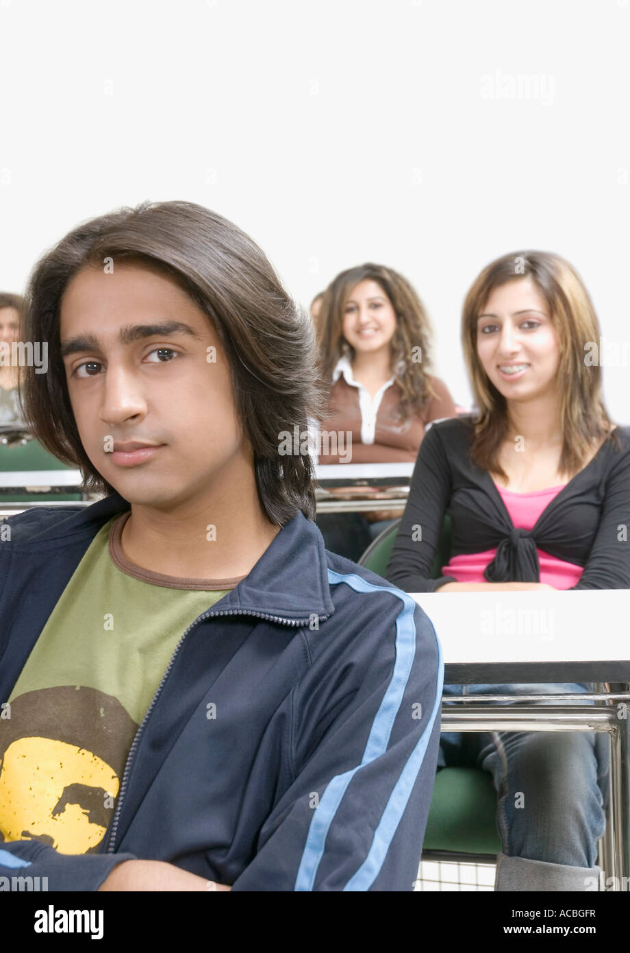 Portrait of college students sitting in a classroom Stock Photo - Alamy
