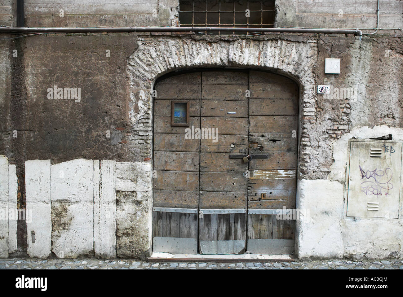 Ancient door in Rome Stock Photo - Alamy