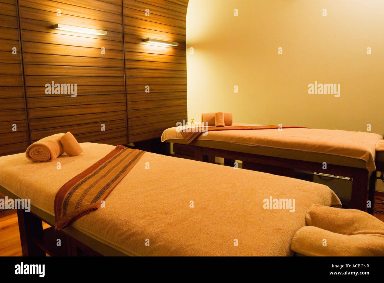 Massage tables in a spa Stock Photo - Alamy