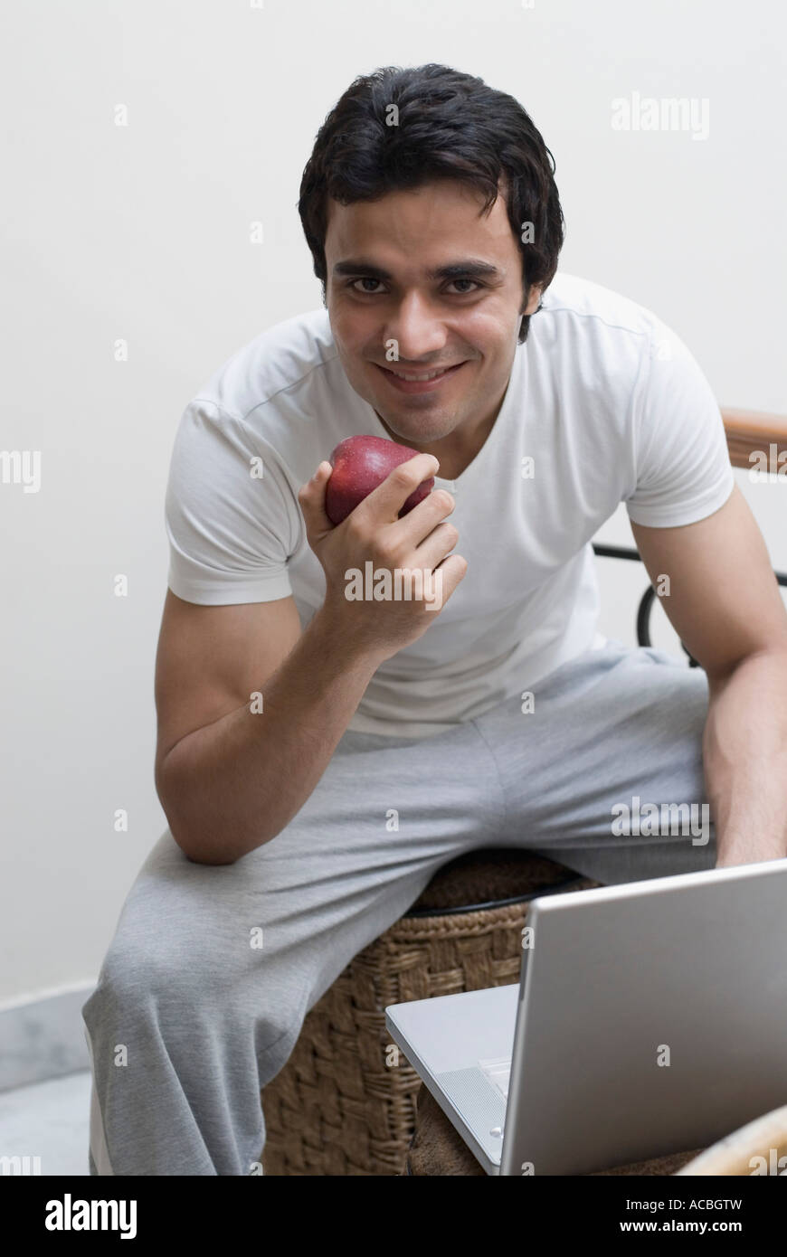 Sitting eating holding food and drink healthy eating hi-res stock ...