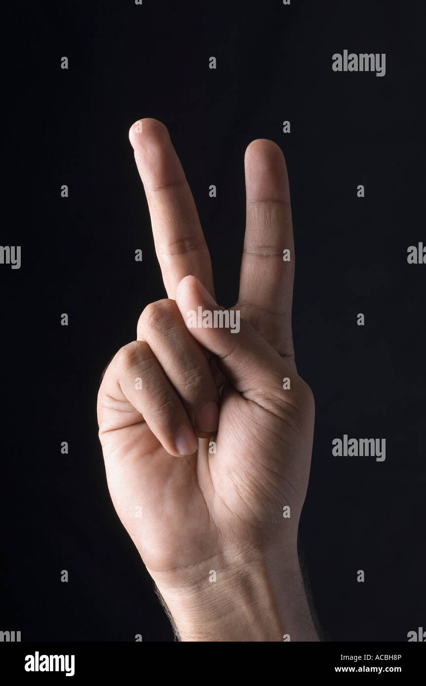 Black man making peace sign hi-res stock photography and images - Alamy