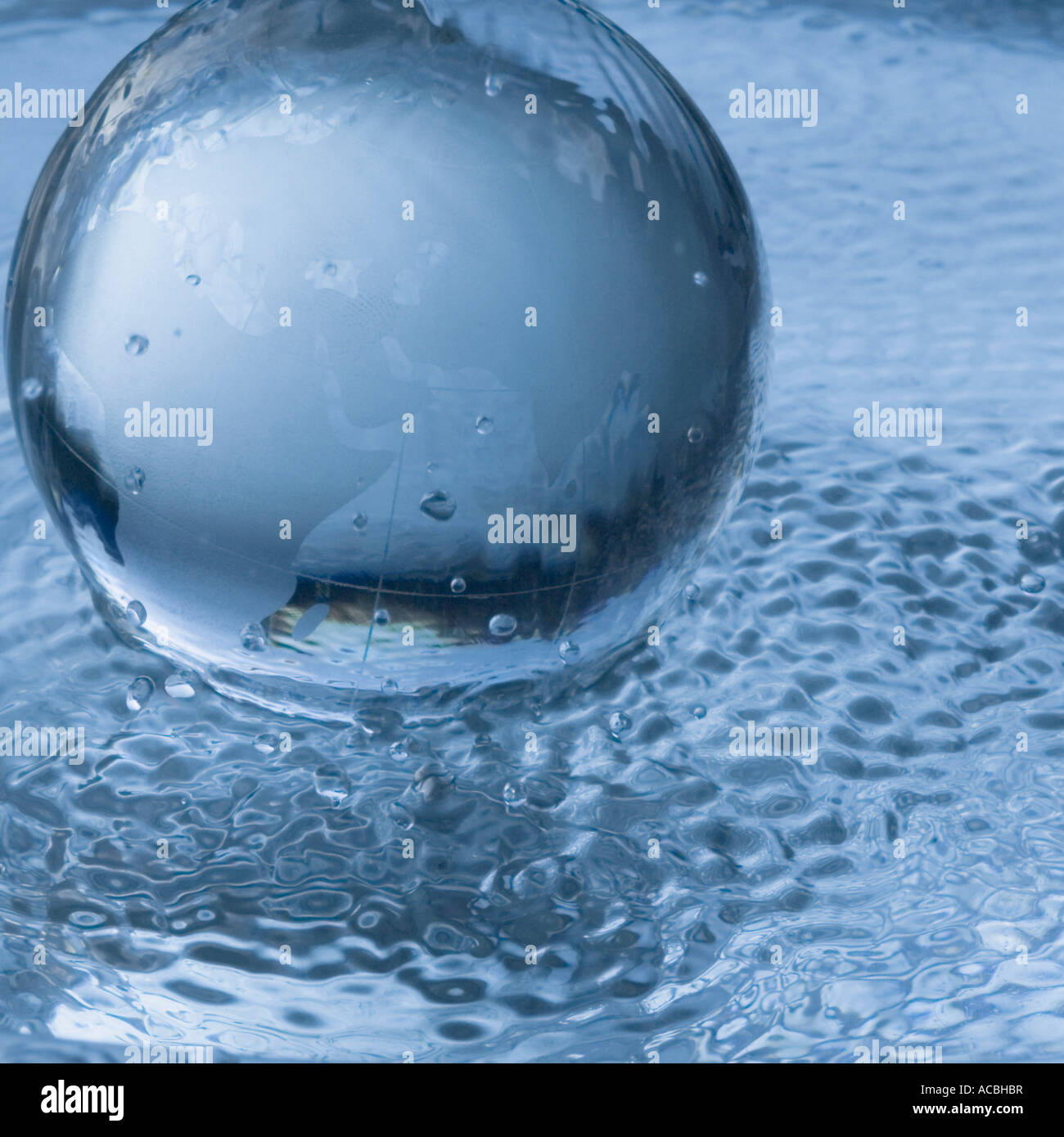 Close-up of a globe on the surface of water Stock Photo - Alamy