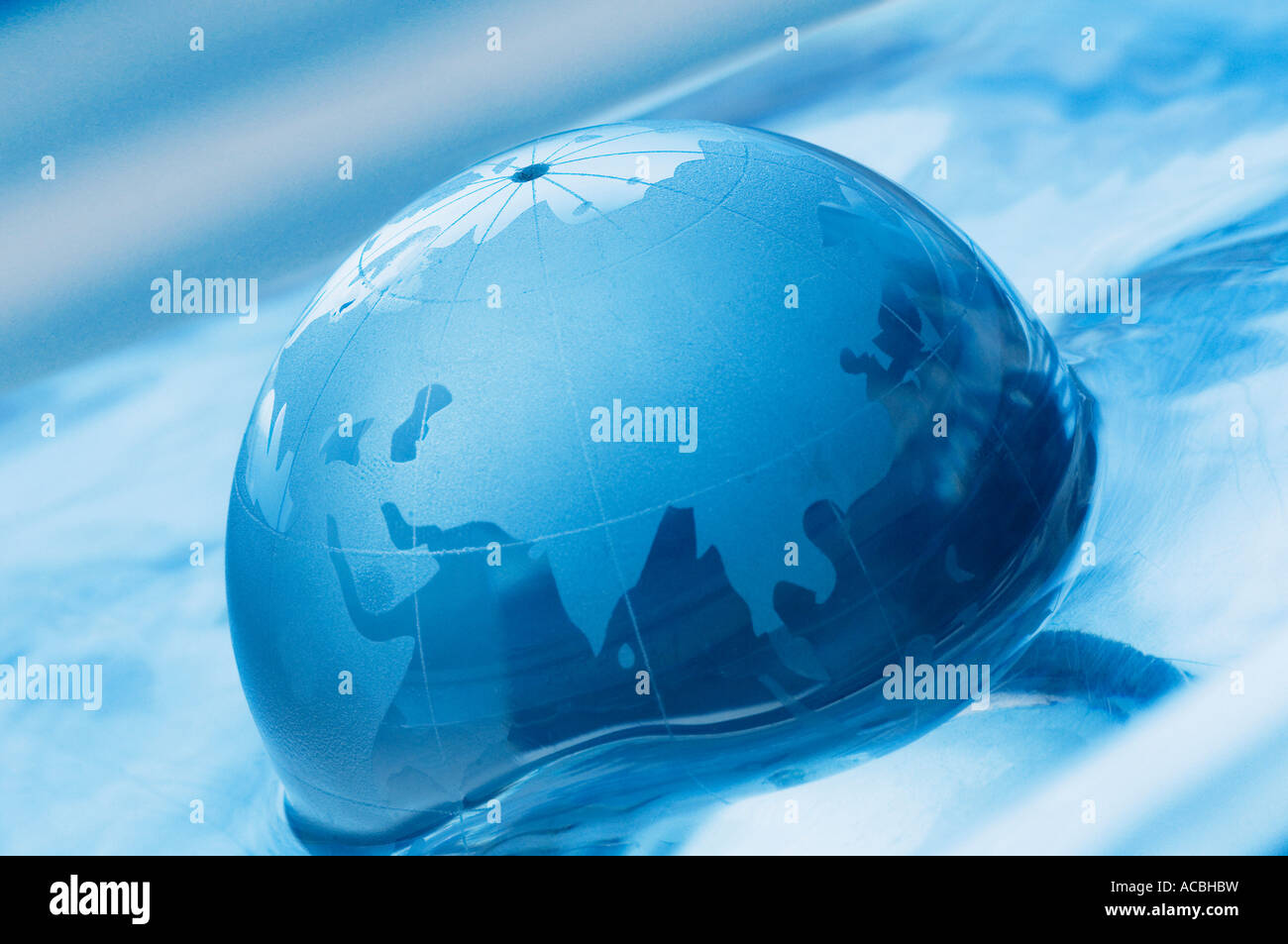 Close-up of a globe on the surface of water Stock Photo - Alamy