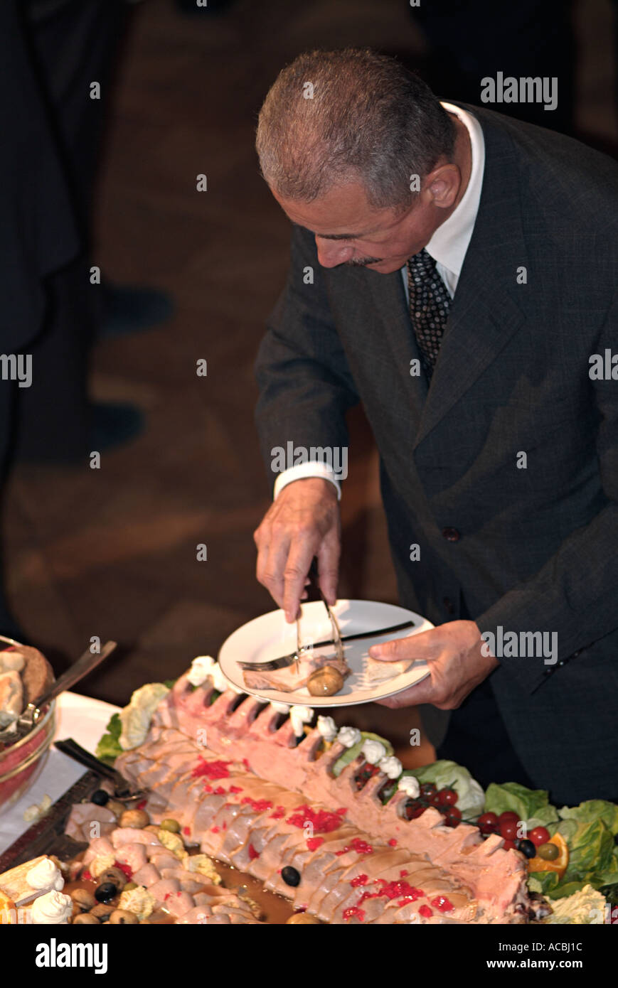 Buffet Lunch Man Selecting Food Stock Photo - Alamy