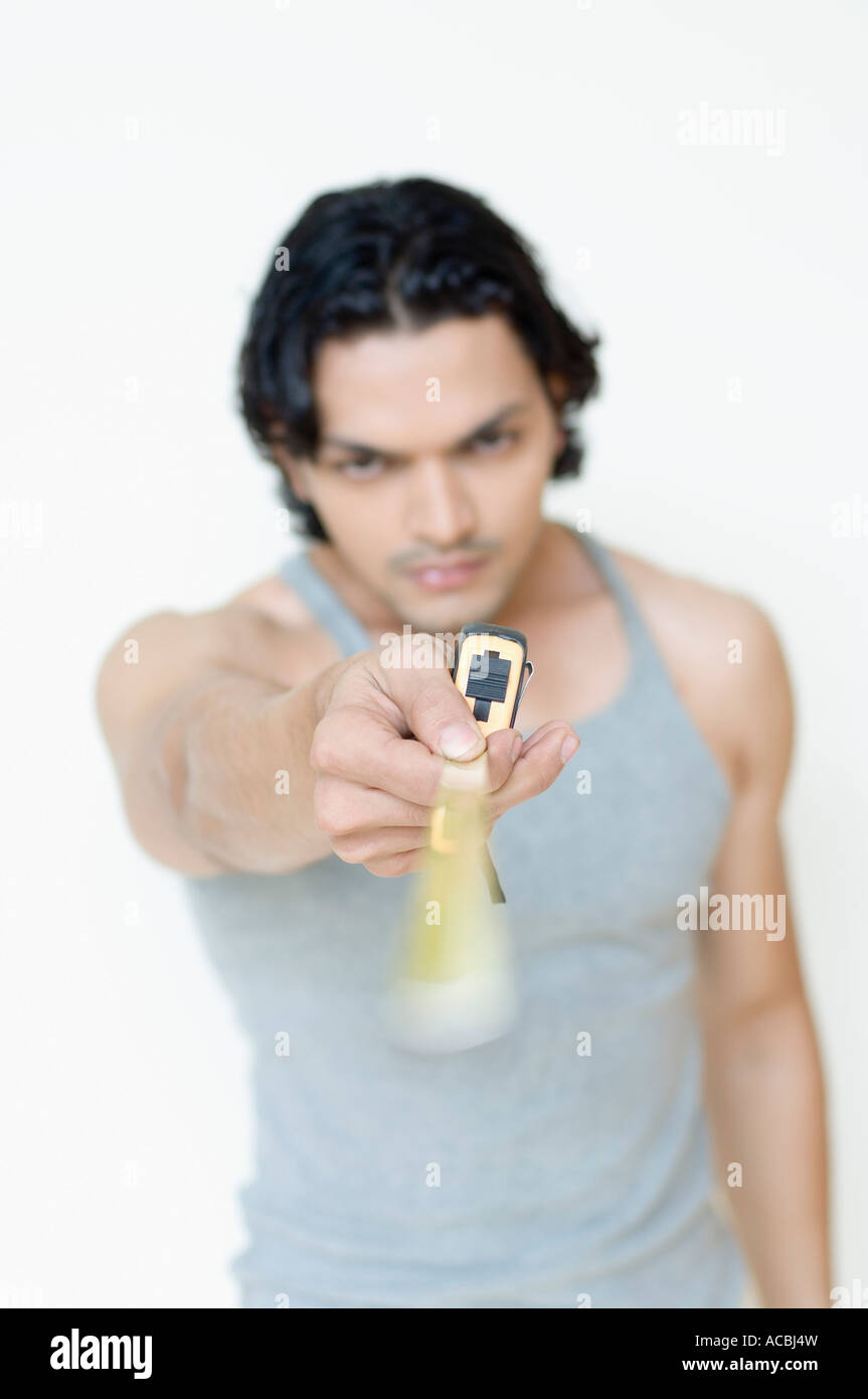 Looking away holding standing measuring instrument of measurement hi ...