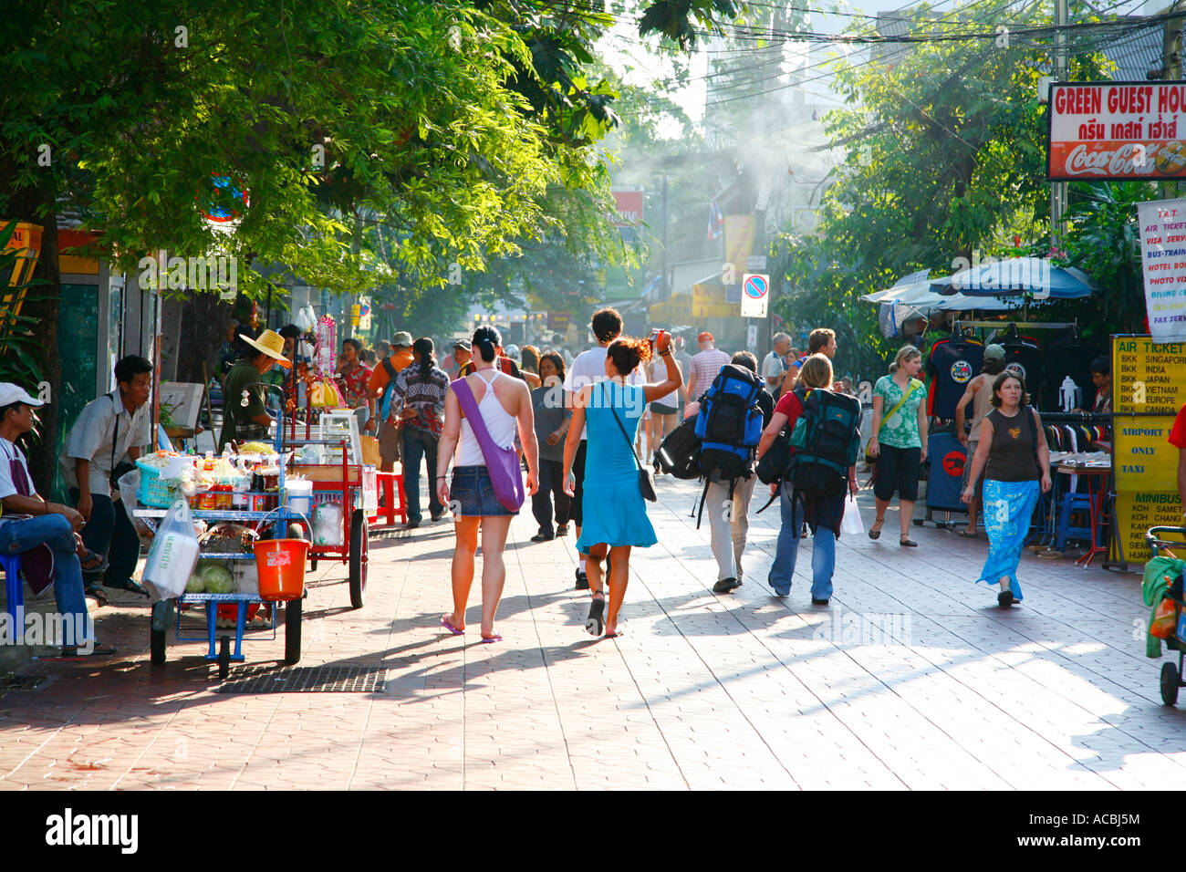 Western tourists on street near Wat Chana Songkram, Bangkok, Thailand ...