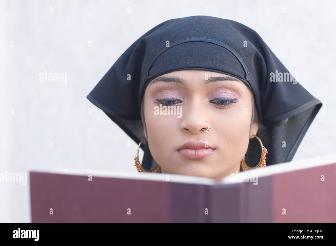 Young busy muslim female hi-res stock photography and images - Alamy