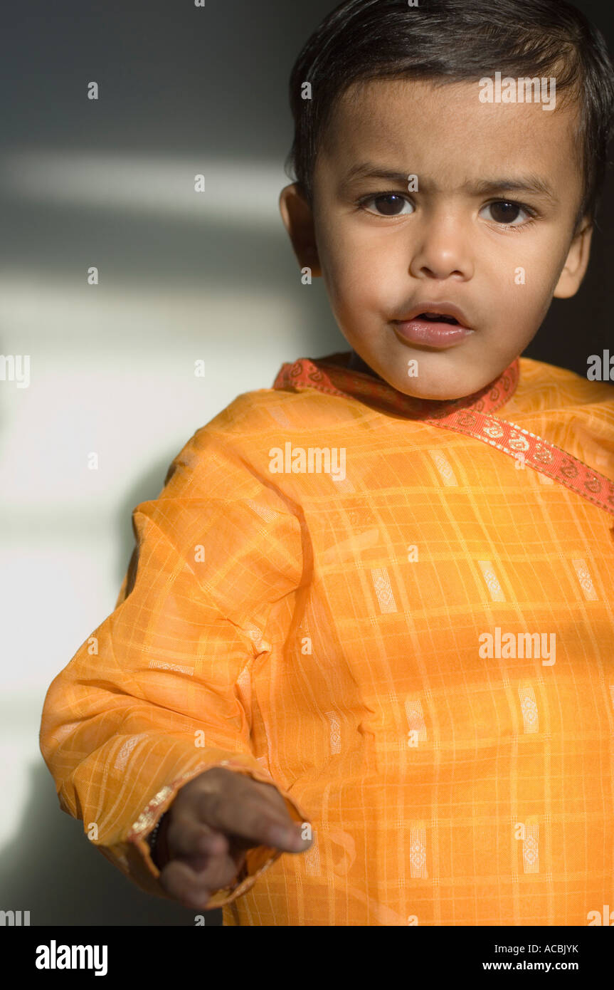 Portrait of a boy standing Stock Photo - Alamy