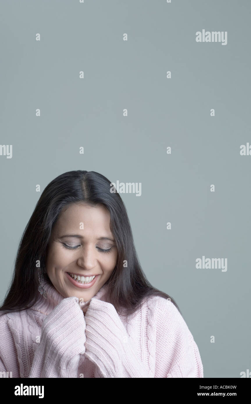 Shy demure young woman hi-res stock photography and images - Alamy