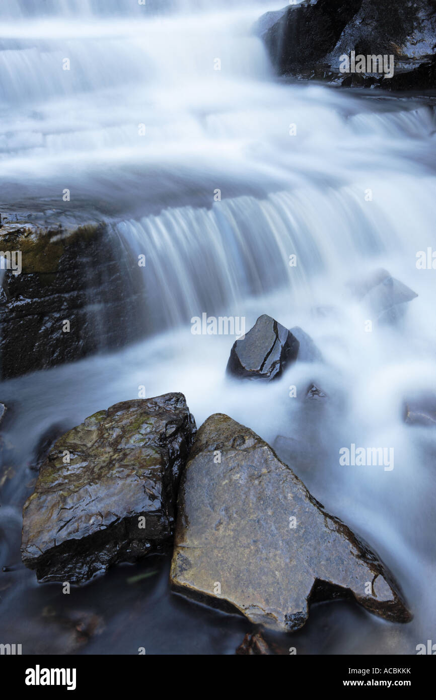 Water flowing over rocks in waterfall Stock Photo - Alamy