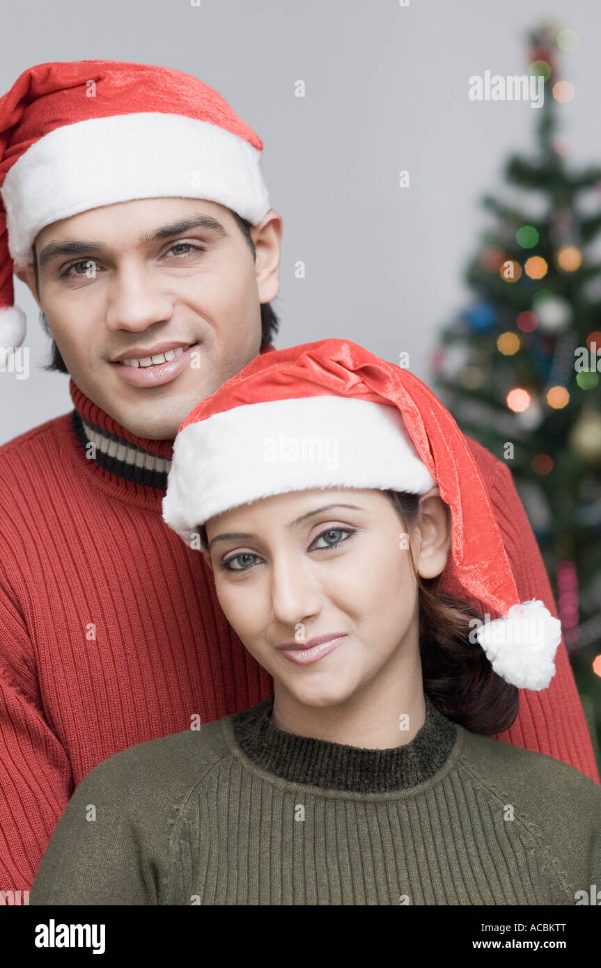 Young asian couple wearing santa hi-res stock photography and images ...
