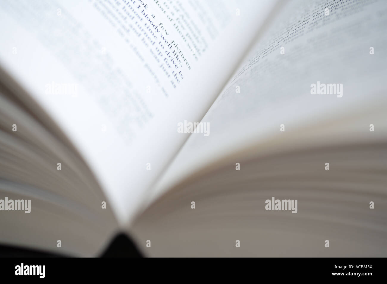 Close up of open book Stock Photo - Alamy