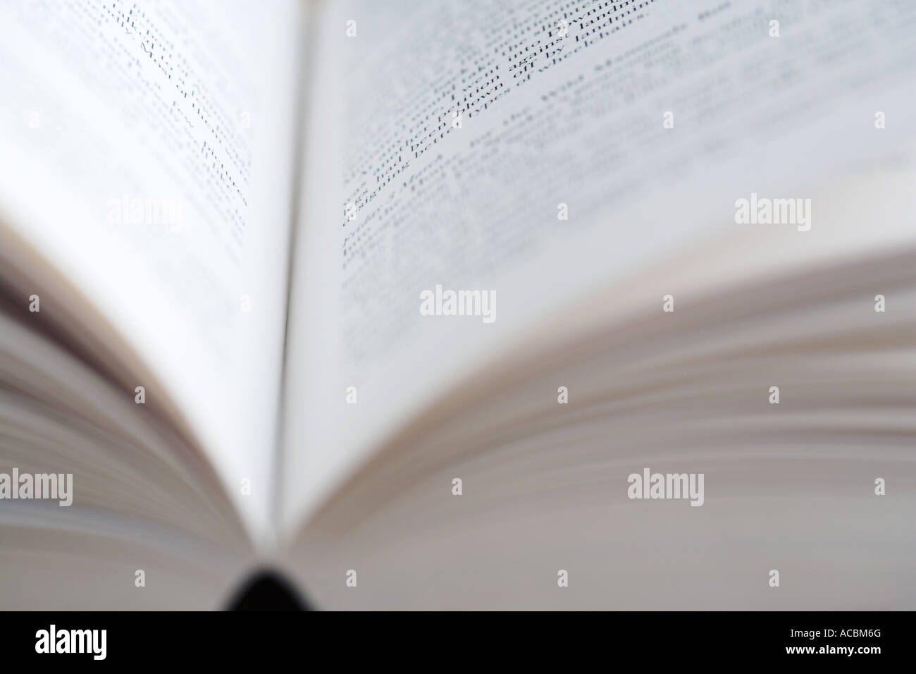 Close up of open book Stock Photo - Alamy