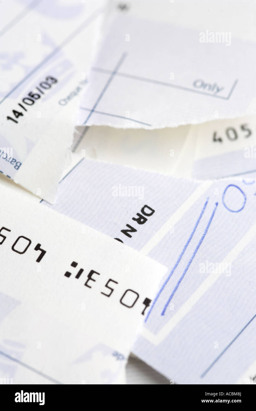 Close up of Bank cheque check torn up Stock Photo - Alamy
