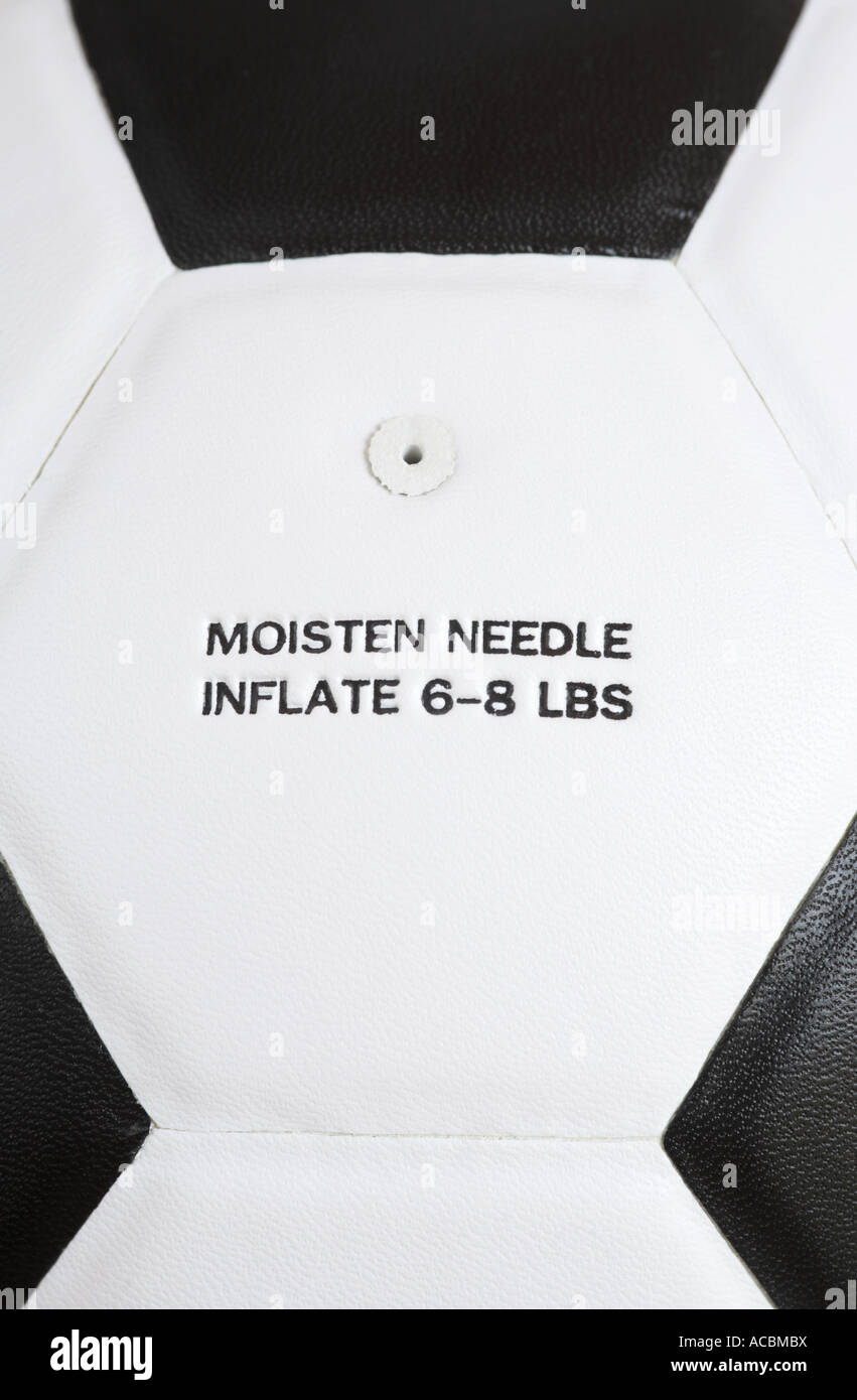 Close up of black and white football inflation point Stock Photo - Alamy