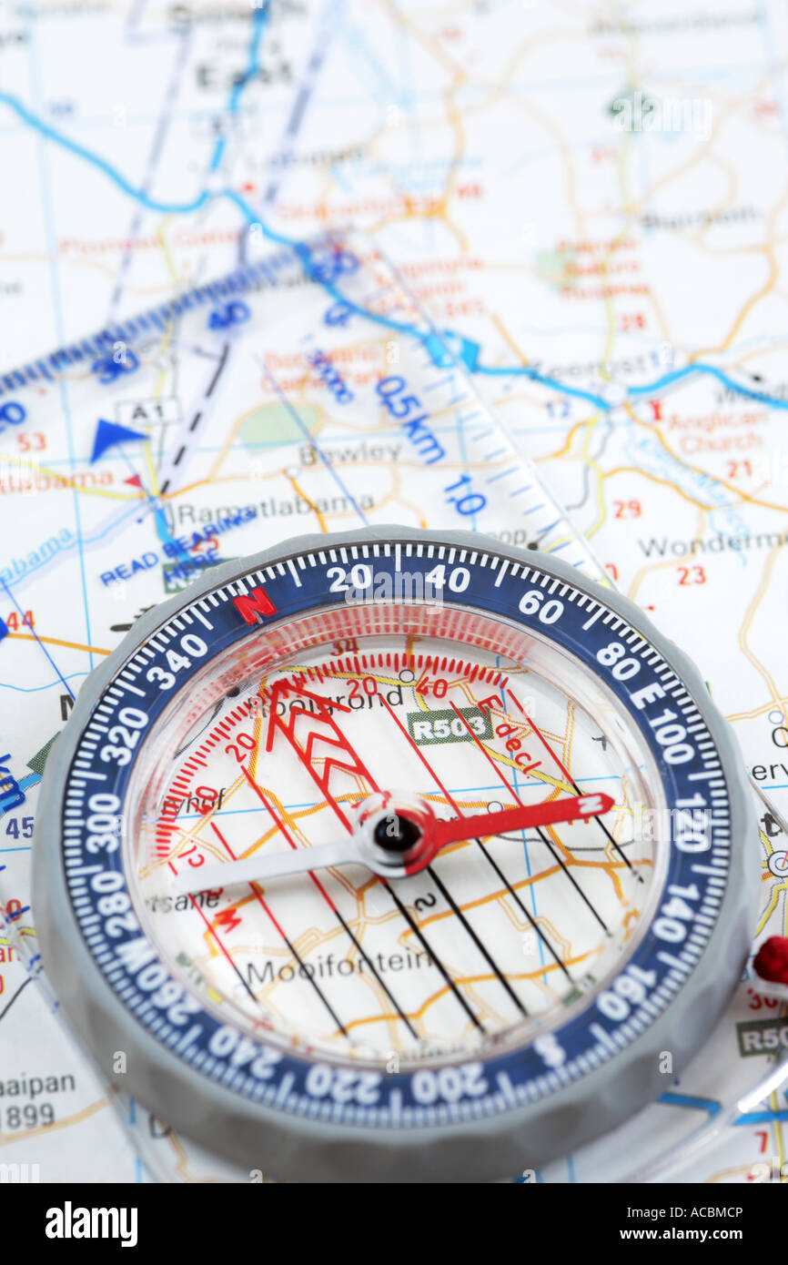 Compass on map Stock Photo - Alamy