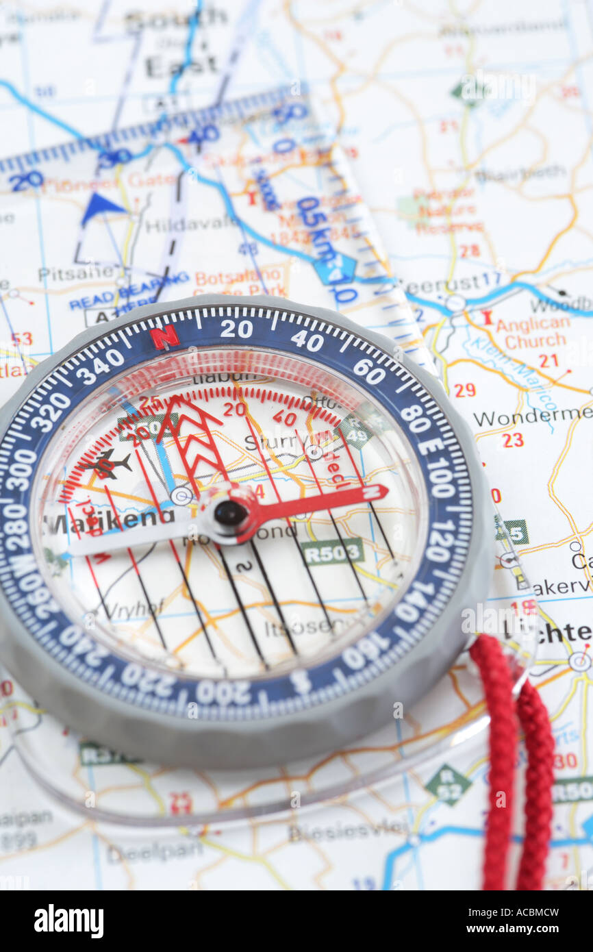 Compass on map Stock Photo - Alamy
