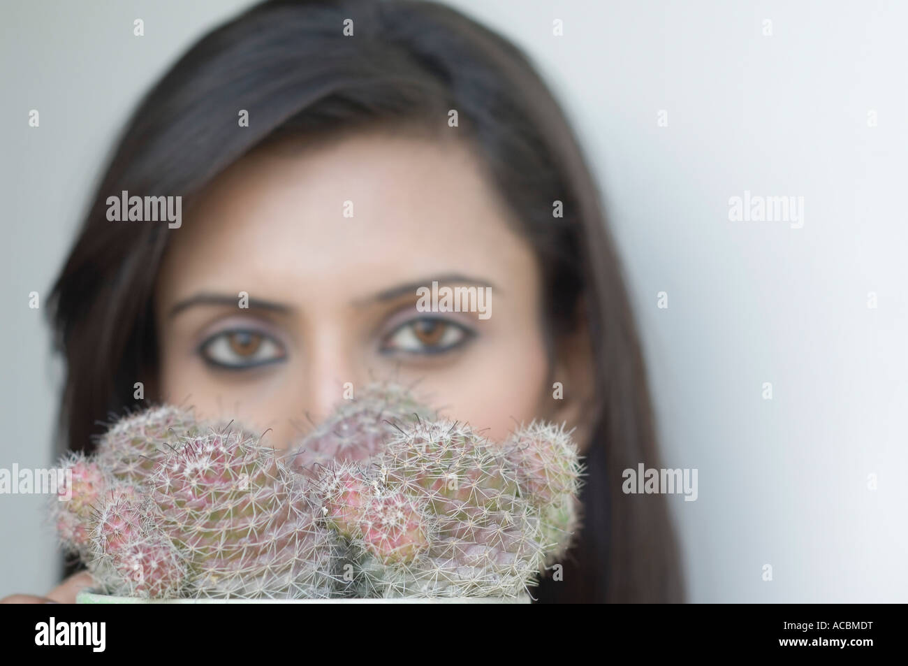 Human face on cactus hi-res stock photography and images - Alamy