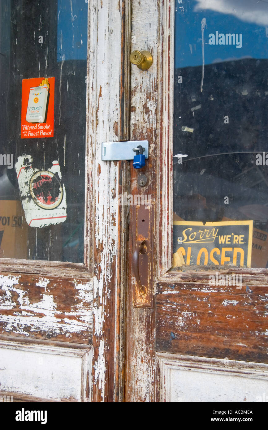 Closed store door with lock Stock Photo - Alamy