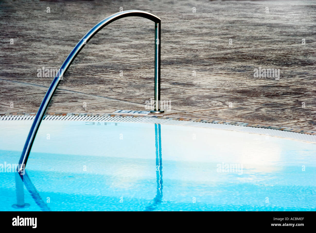 pool stair railing and patio Stock Photo - Alamy