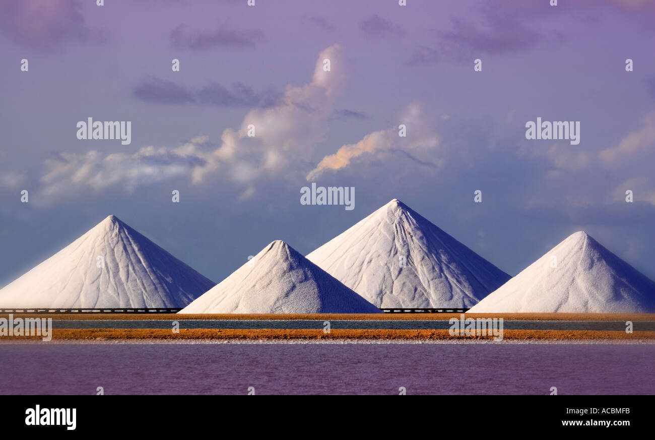 Pyramids of natural salt at solar salt field Stock Photo - Alamy