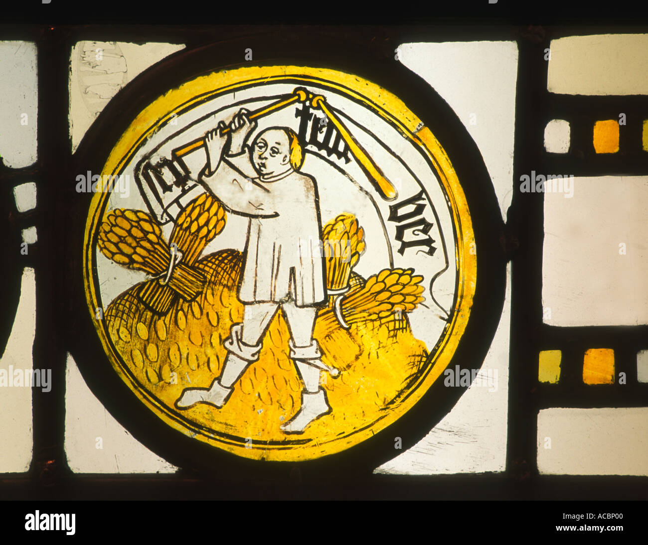 Medieval stained glass roundel labour hi-res stock photography and ...