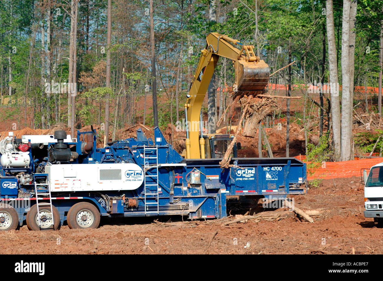 Clearing off land from trees for commercial homes and family ...