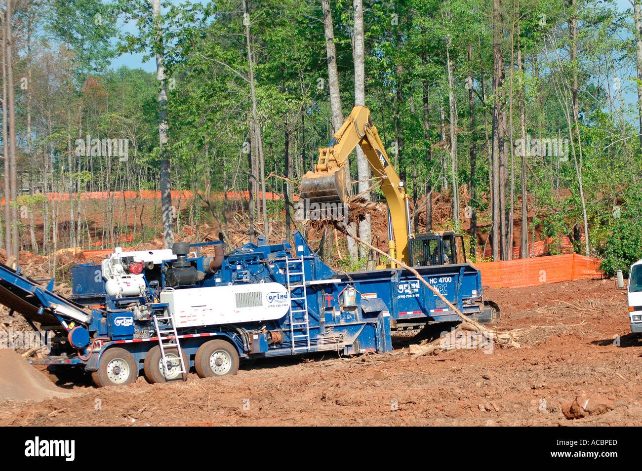 Clearing off land from trees for commercial homes and family ...