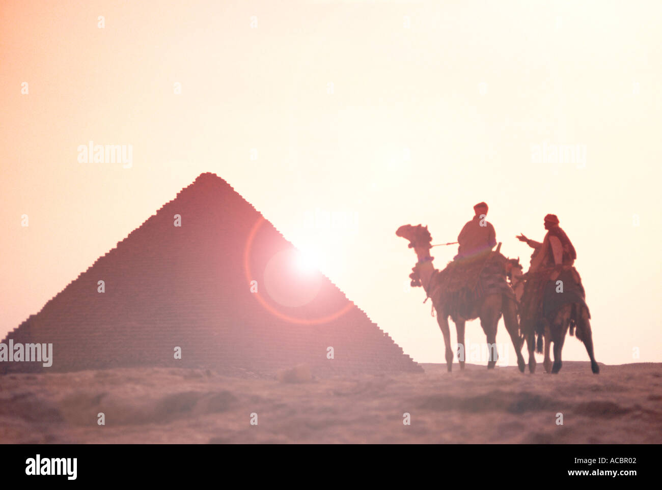 Two riders and Pyramid Stock Photo - Alamy