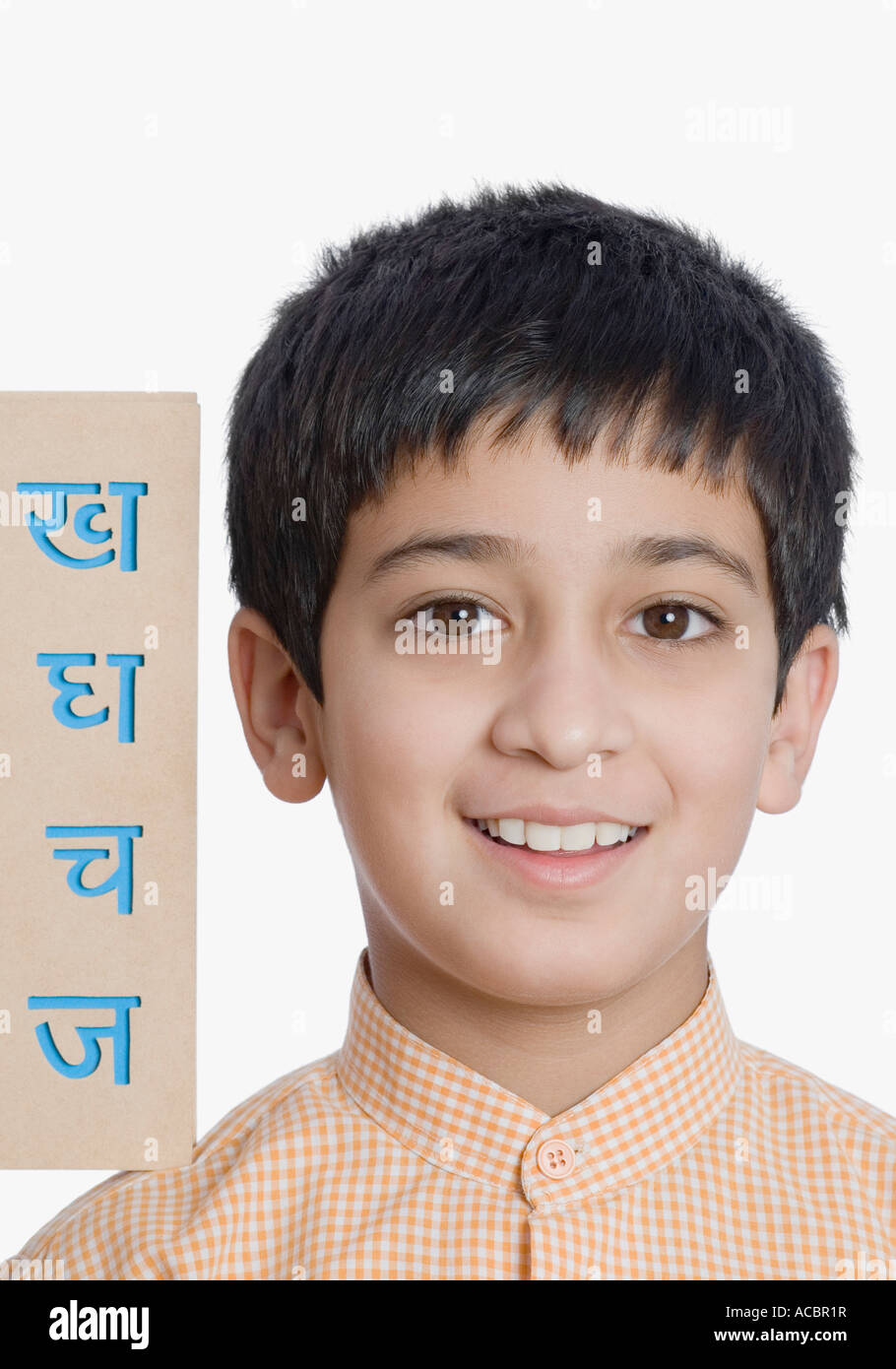 Portrait of a boy smiling Stock Photo - Alamy
