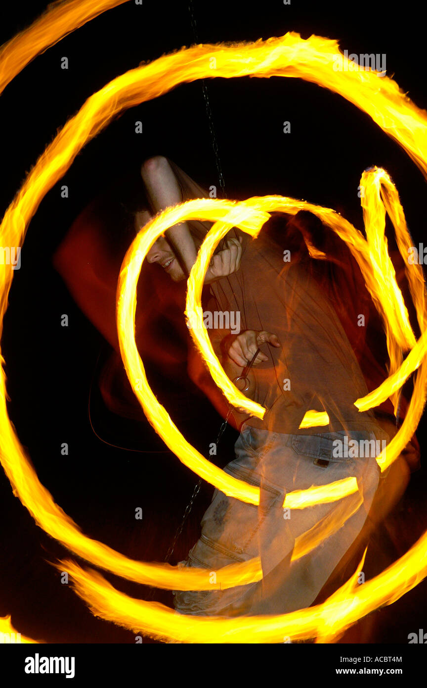 Firedance at night at Hilltop Festival rave party Stock Photo - Alamy
